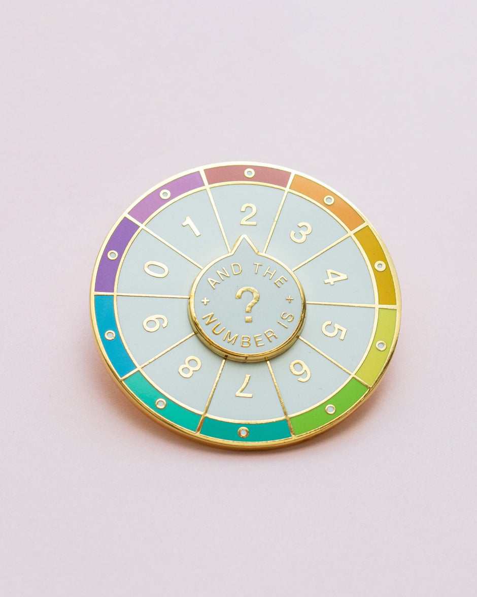 Spinning Numbers Enamel Pin – occasionalish