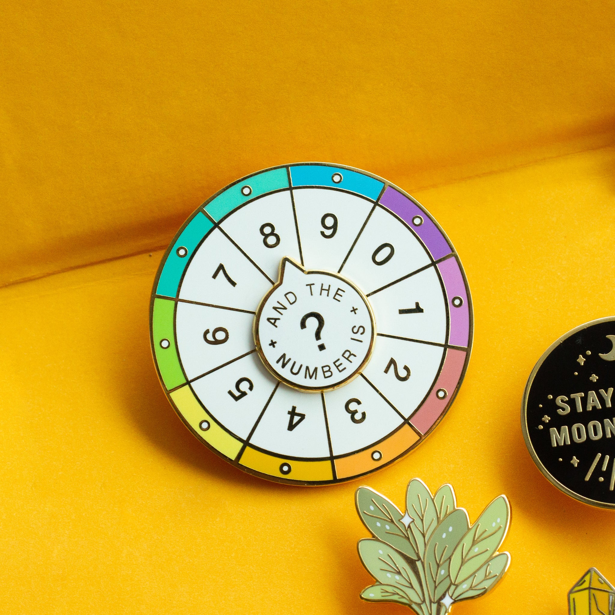 Spinning Numbers Enamel Pin – occasionalish